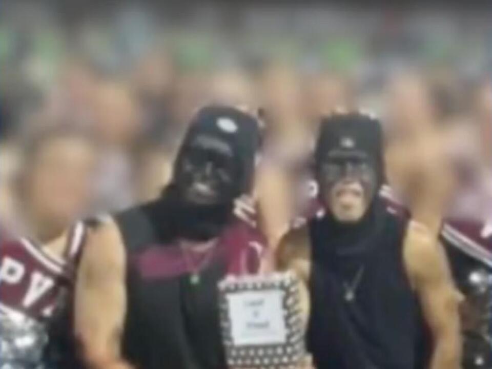 Students pictured wearing blackface at football game celebrated for ...