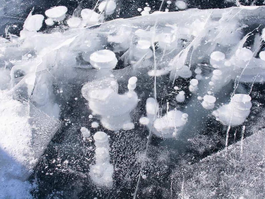 The Reason for the Unusual Shapes of the Frozen Water in Lake Baikal