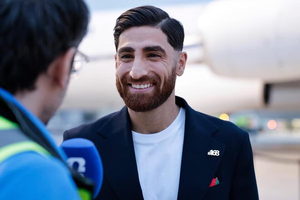 Iran’s World Cup players wear #168 lapel pins as they arrive in Mexico ...