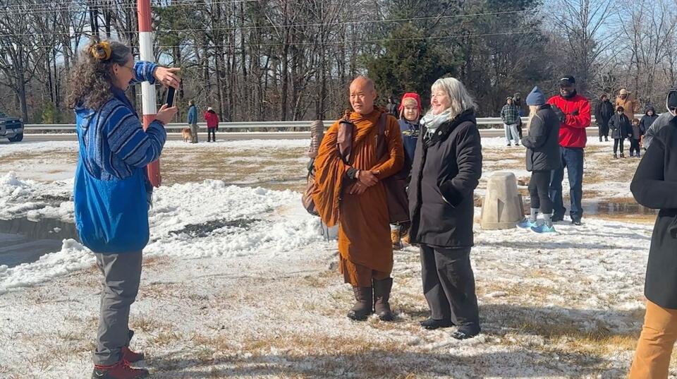 Buddhist monks, supporters battle freezing temperatures after winter ...