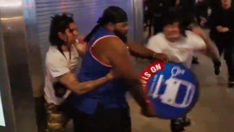 Madness In NYC — Knicks Fan Uses Street Sign As Weapon As Massive Brawl ...