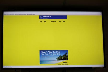 Global cyber outage hits air travel, leaving passengers in limbo ...
