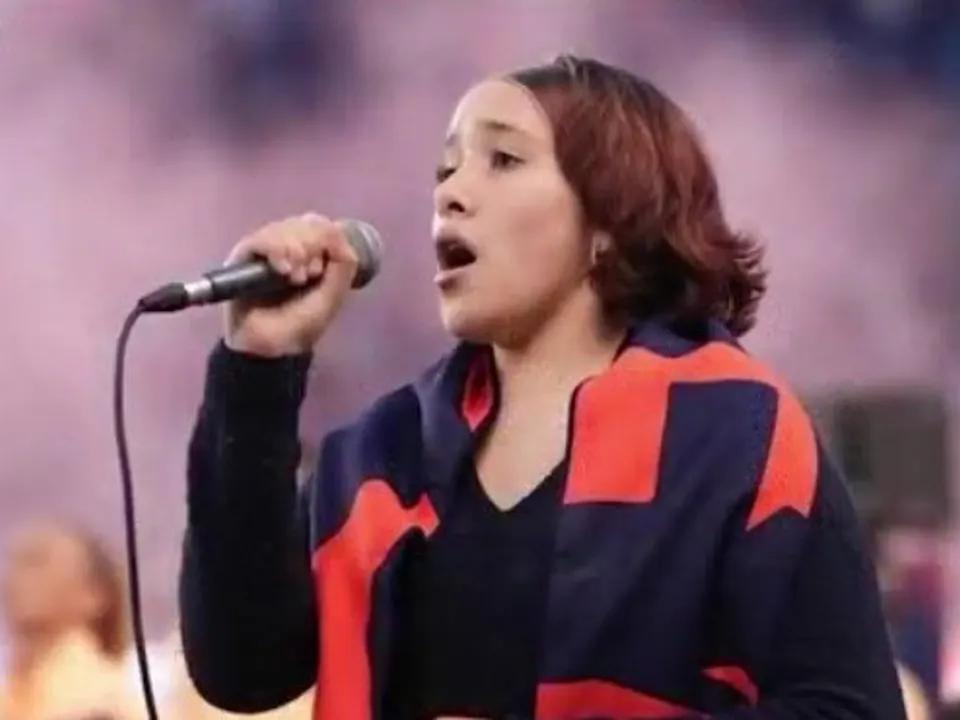 Teen national anthem singer loses father days after performance
