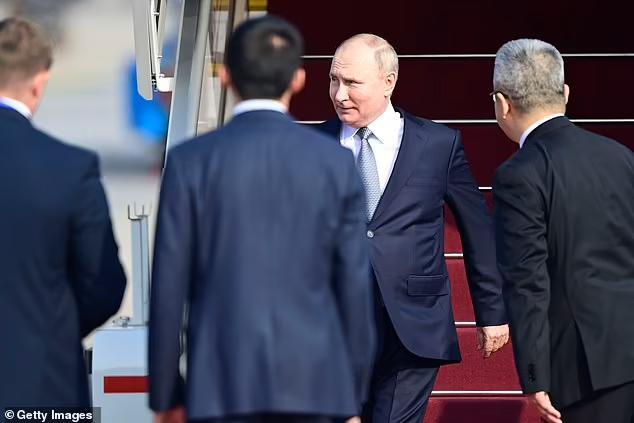 Putin arrives in China to meet President Xi in rare international trip ...