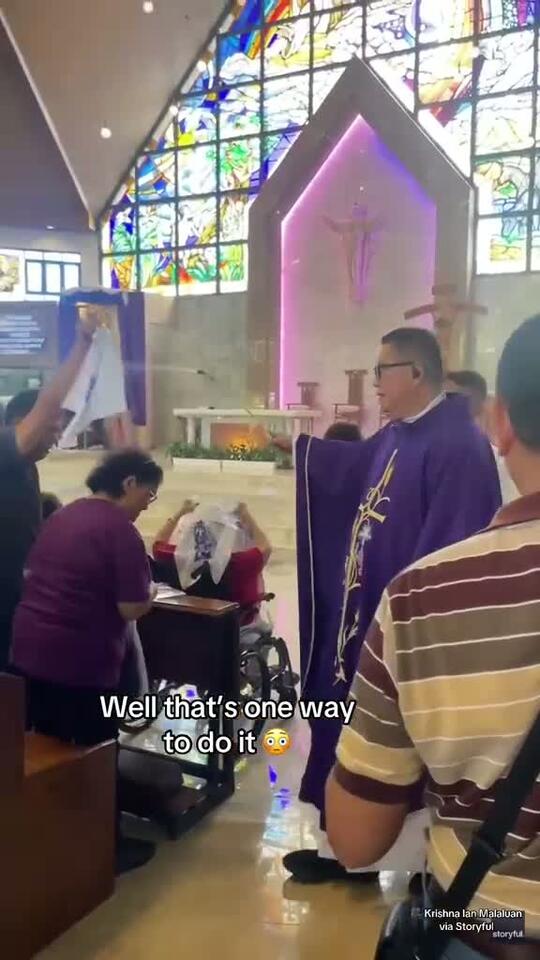 A priest in the Philippines had a very unique way of spraying his ...
