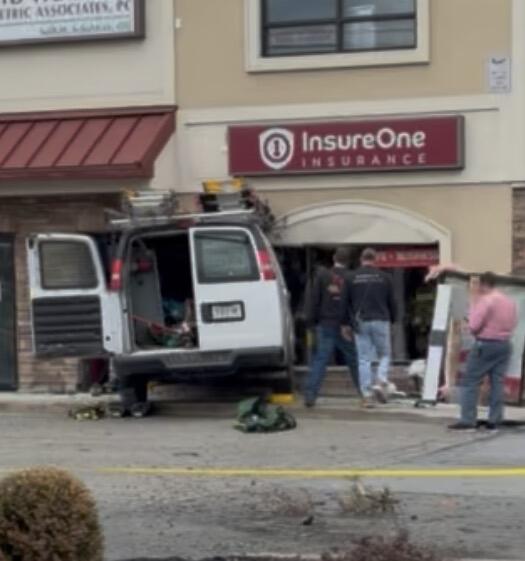 Construction van crashes into Monroe business after collision with ...