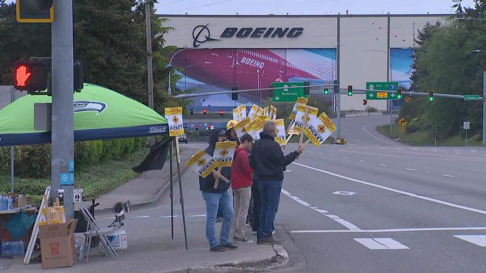 Boeing firefighters picket outside Renton facility amid contract ...