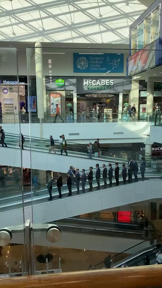 698_Teenage_Boys_Lined_up_in_Suits_and_Doing_the_Minion_Hand_Gesture_on ...