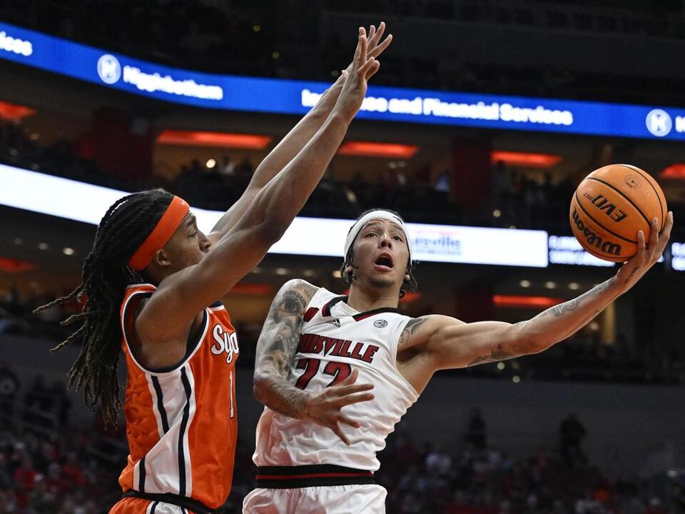 Former Louisville Wing Tre White Transfers to Illinois