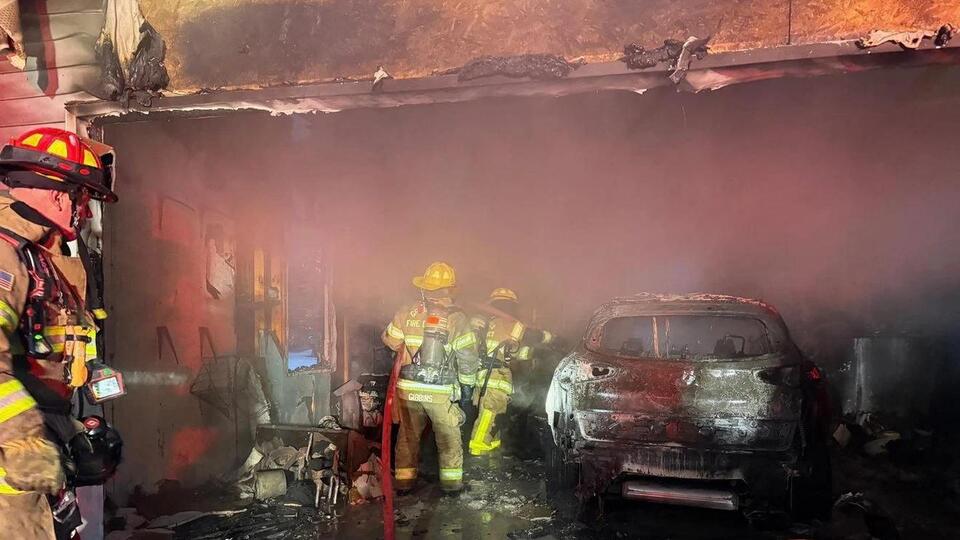 Fire crews quickly contain car fire inside Greenfield garage - NewsBreak