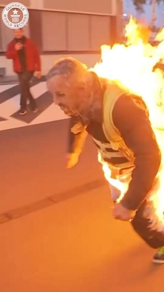 Watch: Stunt performer pulls a car while on fire to break world record ...