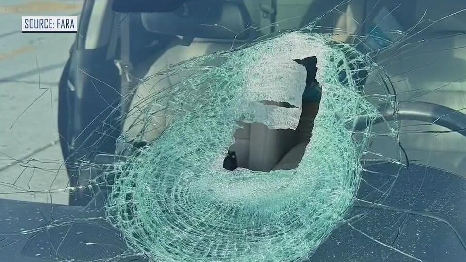 Object crashes through windshield, nearly hits driver in freak accident ...