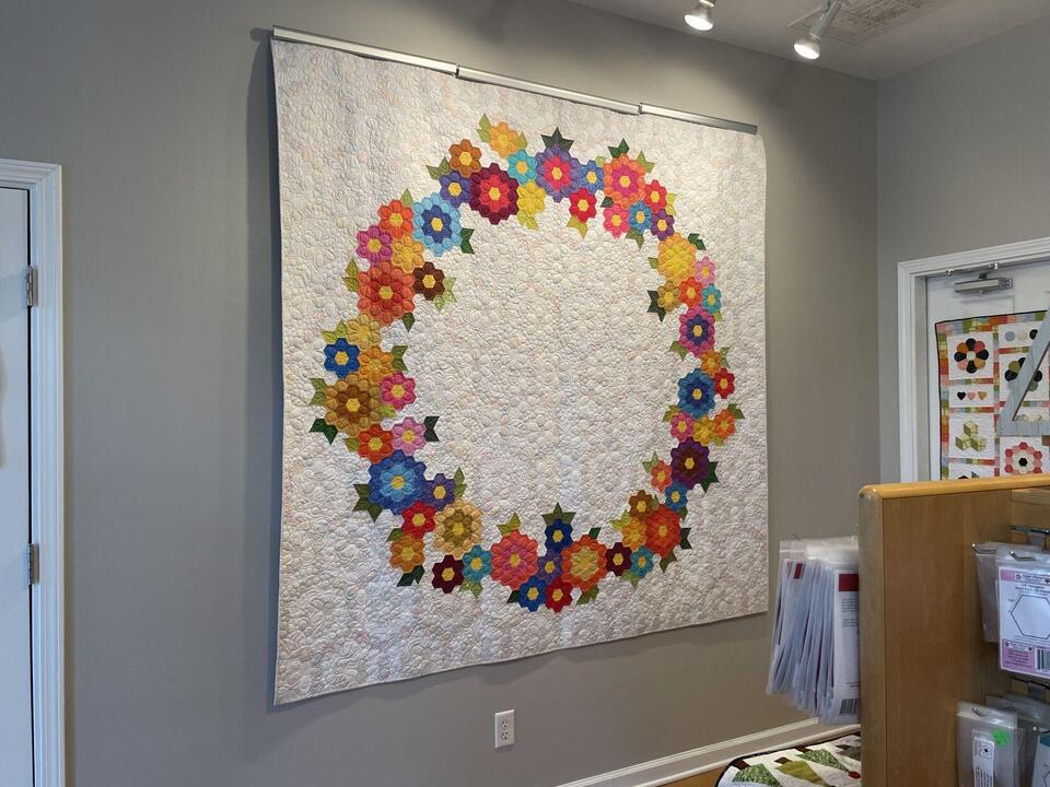 Local quilting shops prepare for influx of visitors during AQS ...