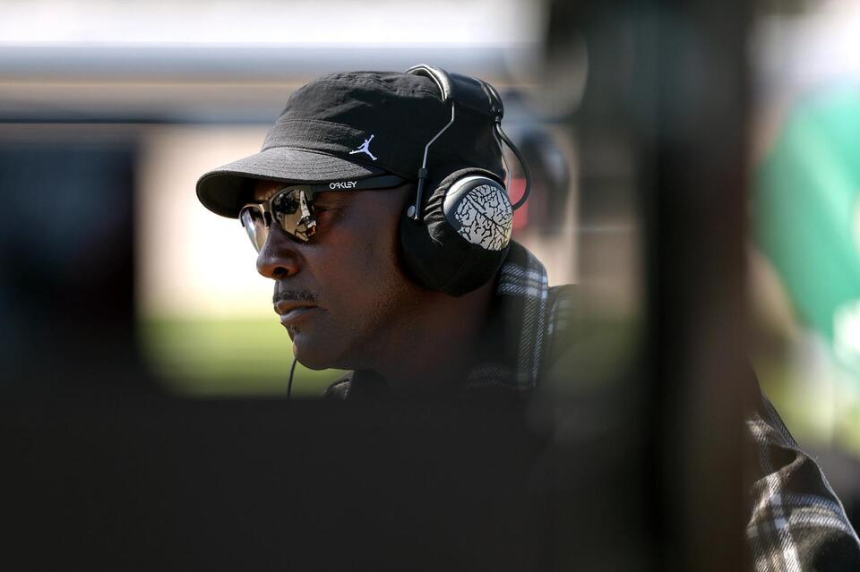 Denny Hamlin Reacts to Michael Jordan’s Viral Choke-Kiss Moment After ...