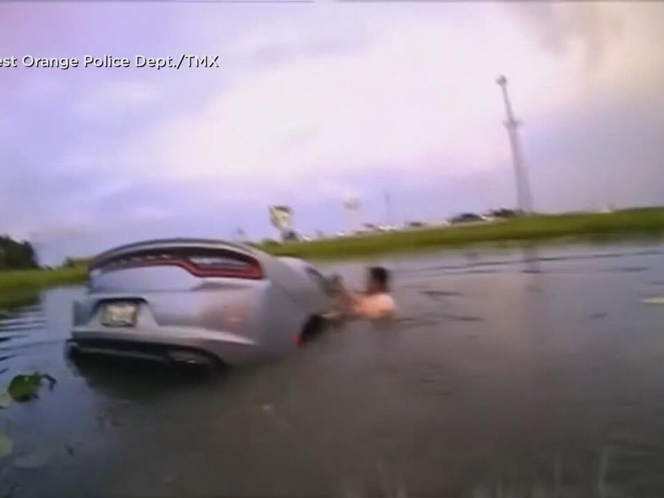 Shocking bodycam video shows police save woman from submerged car in Texas