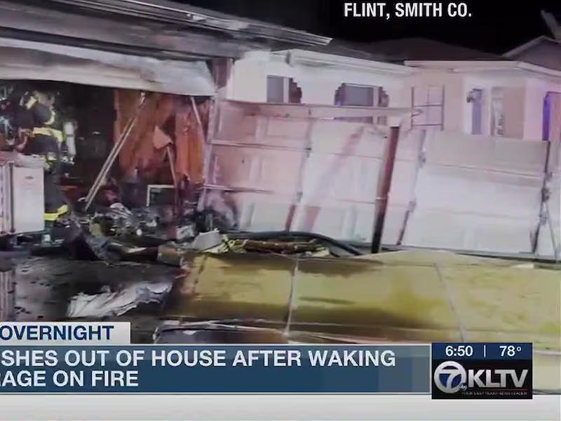 Neighbors alert sleeping Flint family to burning garage