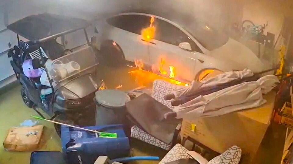 Family flees home after Tesla catches fire after Hurricane Helene ...
