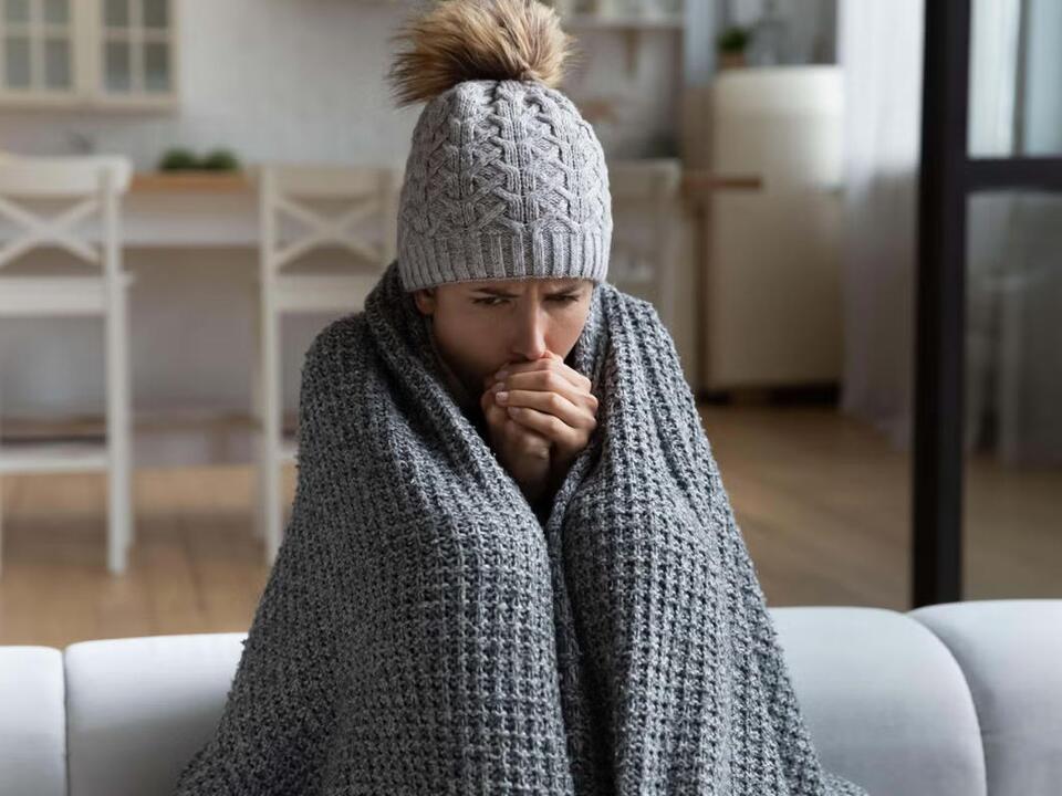Ways to keep warm at home without cranking up the central heating – as ...
