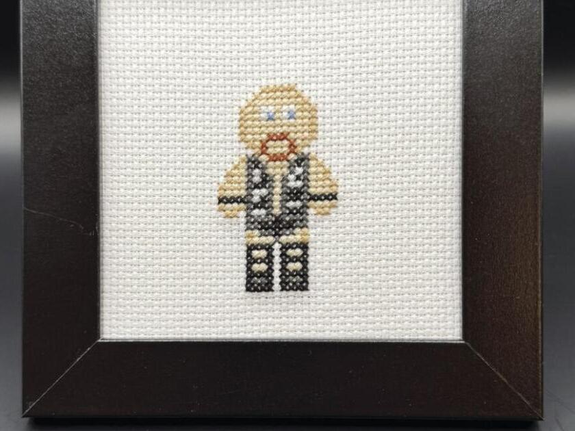 The art of cross stitch…and wrestling