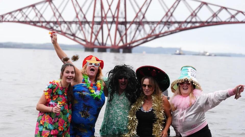 Thousands brave freezing Forth for annual Loony Dook - NewsBreak