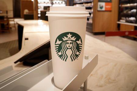 Activist investor Elliott builds sizeable stake in Starbucks, say ...