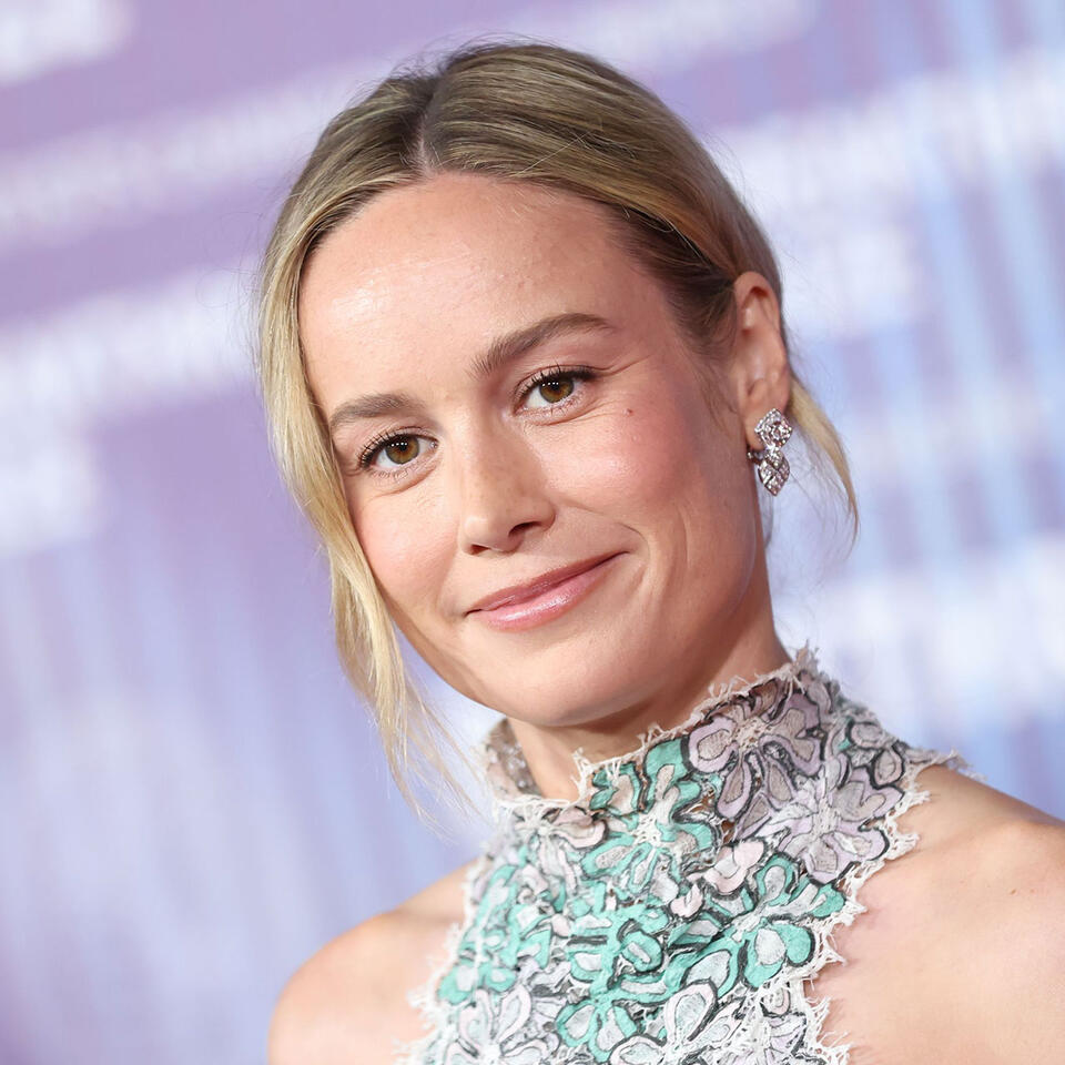 Brie Larson Stuns Wearing A Versace Mini Skirt And A Crisp Button-Down ...