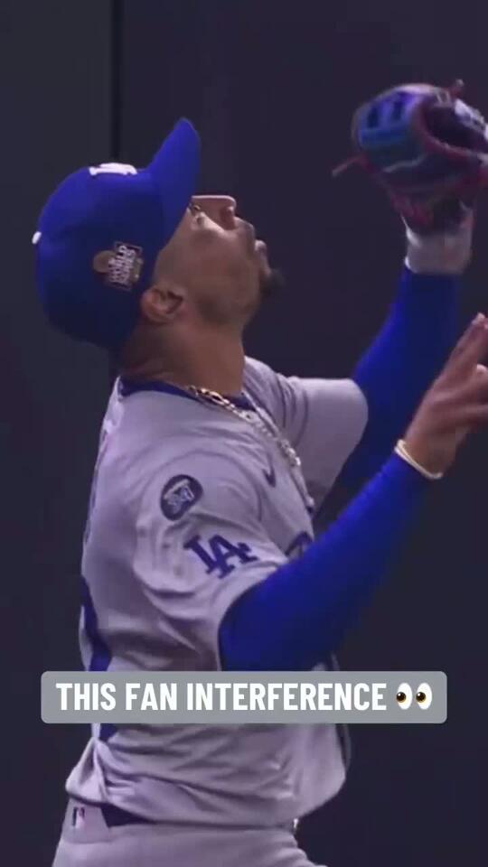 Fan interference was called on this play when a Yankees fan tried to ...