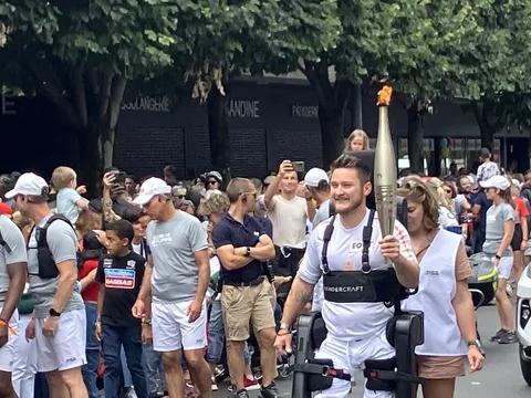 Paralyzed Kevin Piette walks with Olympics 2024 torch while wearing ...