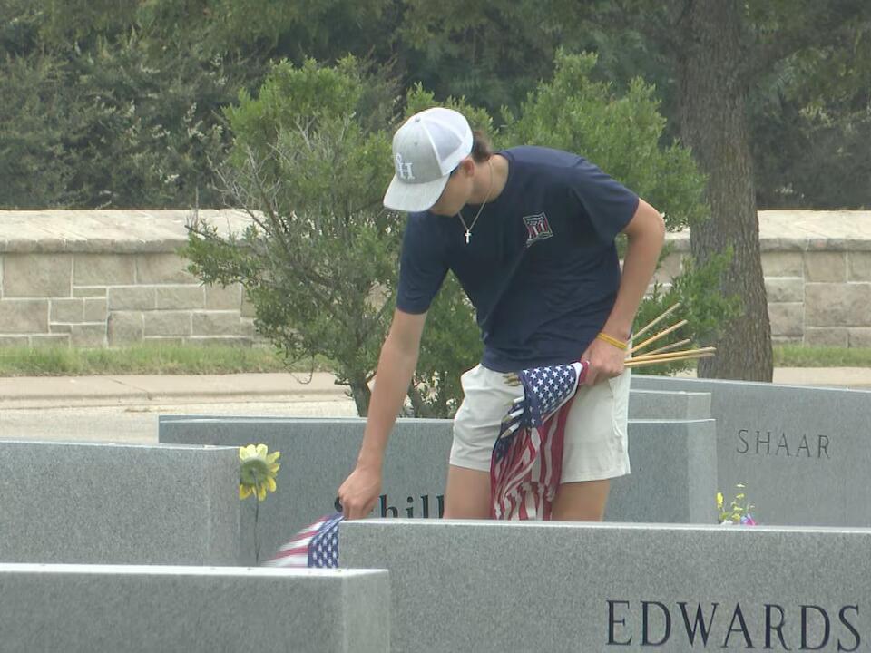 Flag placement event held at the Aggie Field of Honor