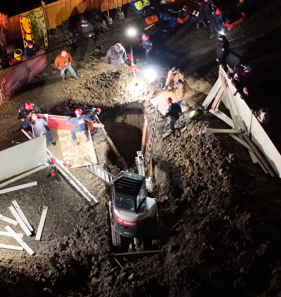 2 people stuck inside deep hole after it collapses - NewsBreak