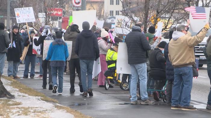 The Tri-City Democrats organization protests against president's ...