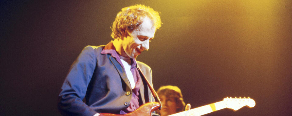 The Meaning Behind “Walk of Life” by Dire Straits and How It Was ...