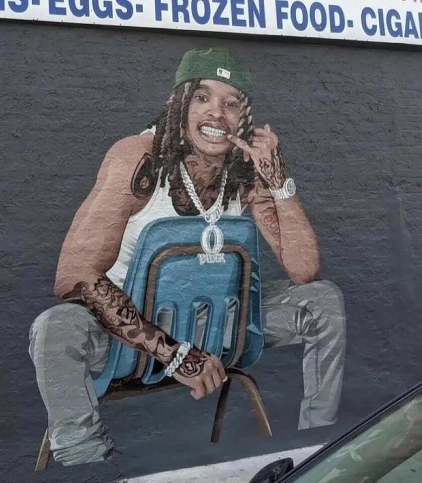 King Von Mural across from Parkway Gardens removed - NewsBreak