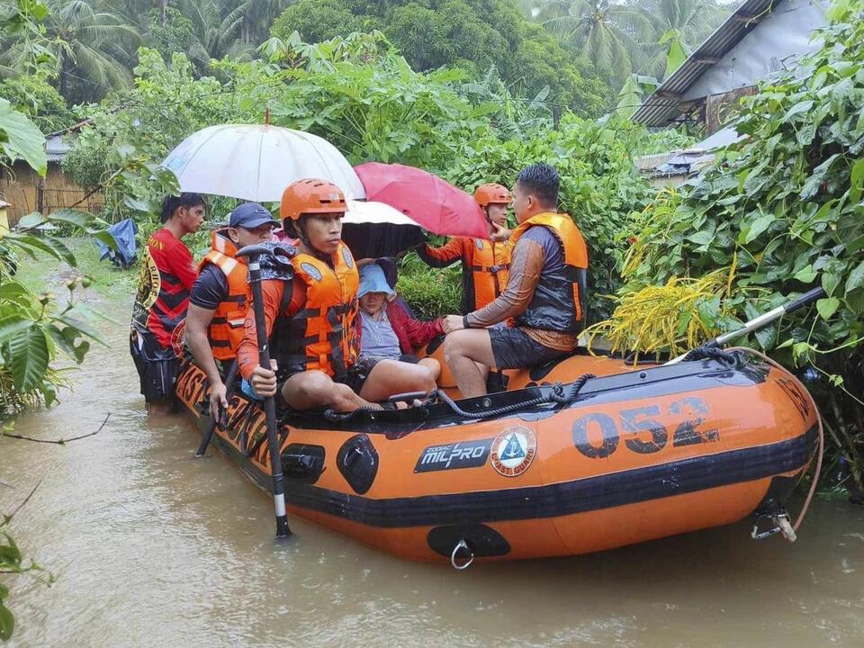 Storm sets off floods and landslides in Philippines, leaving at least 14 dead