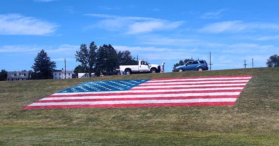 School District Employees Paint U.S Flag on Hill in Bristol Borough on ...