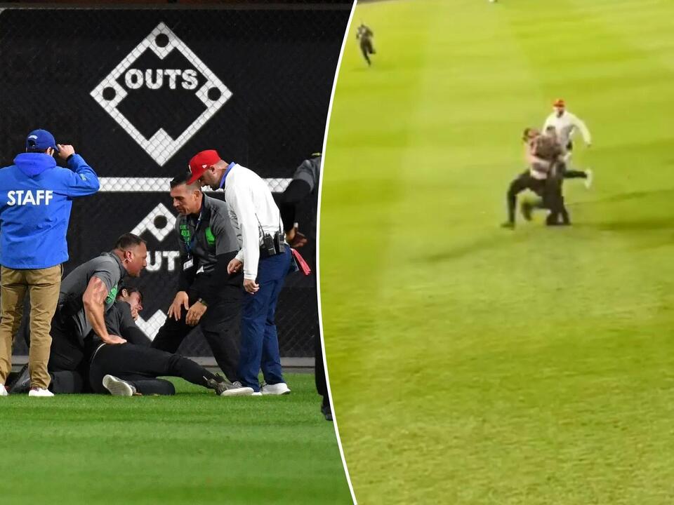 Phillies fan gets tackled hard by security guard after charging field ...