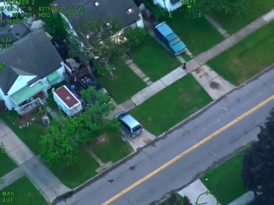 Aerial video shows Michigan State Police tracking suspect wanted for ...