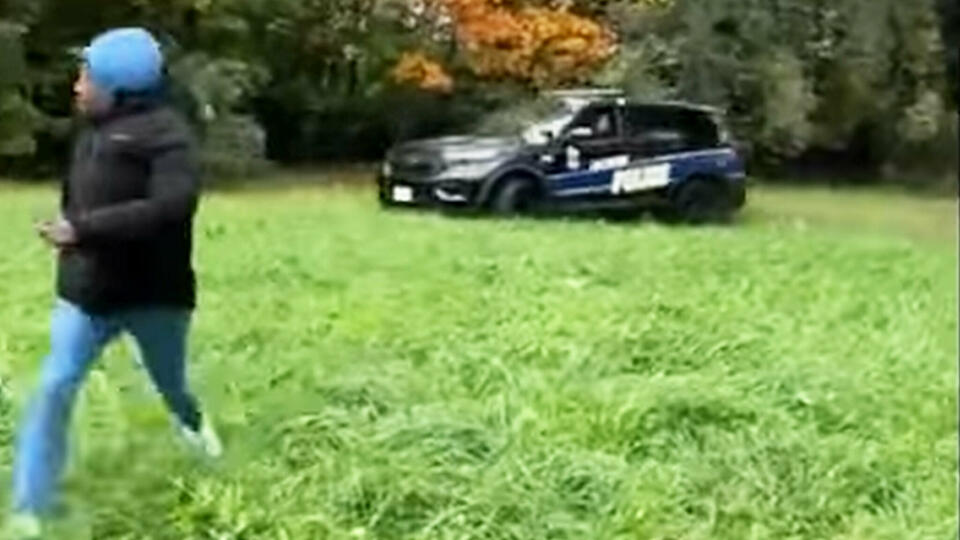 Police Officer Caught On Video Trying To Run Down A Man - NewsBreak