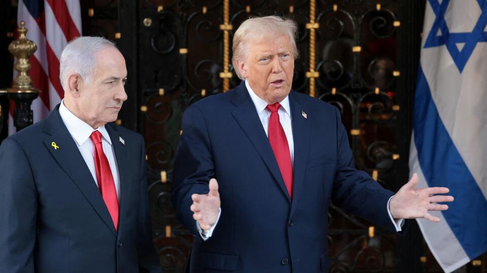 Trump threatens to 'knock the hell' out of Iran if they build weapons ...