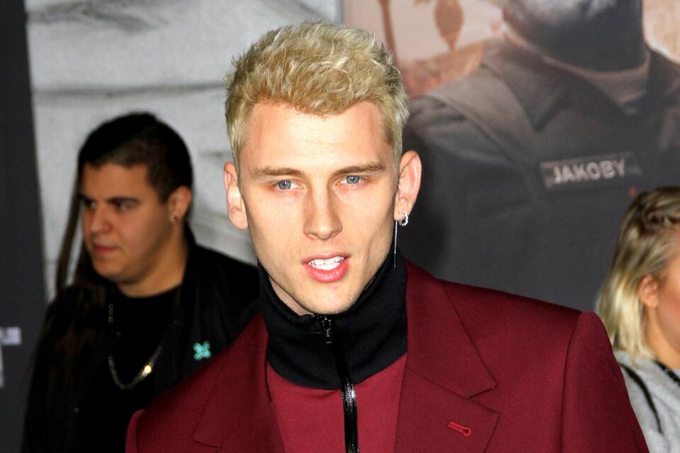 Machine Gun Kelly Debuts New Ear Tattoos at 2026 Grammys Party - NewsBreak