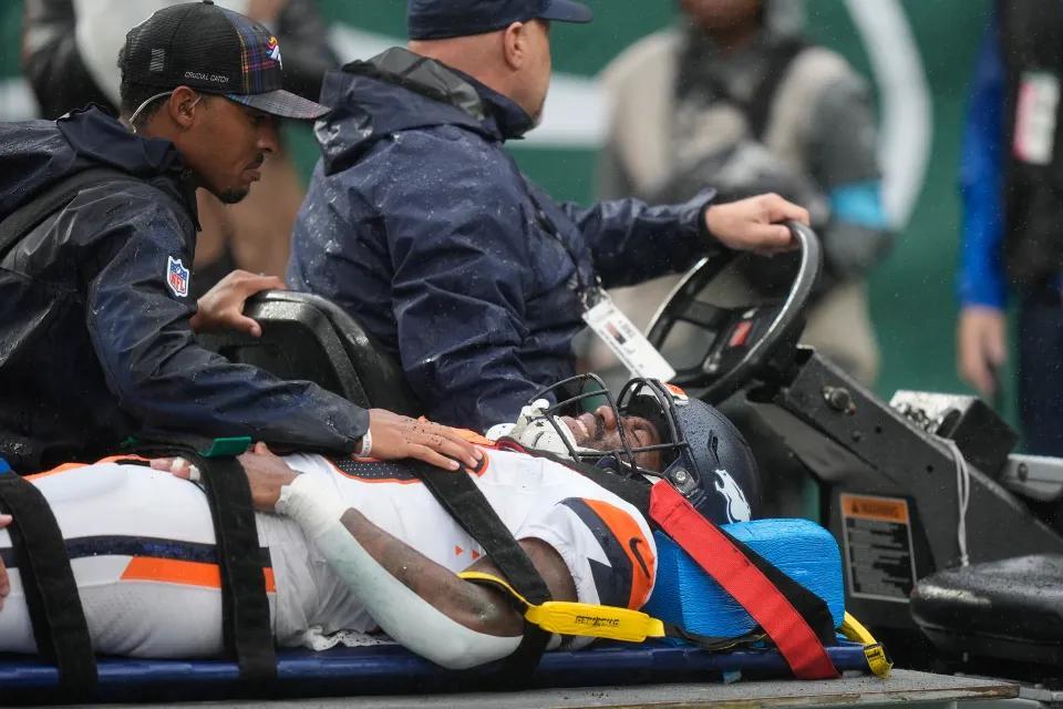 NFL star Tyler Badie collapses on sidelines and is stretchered away in ...