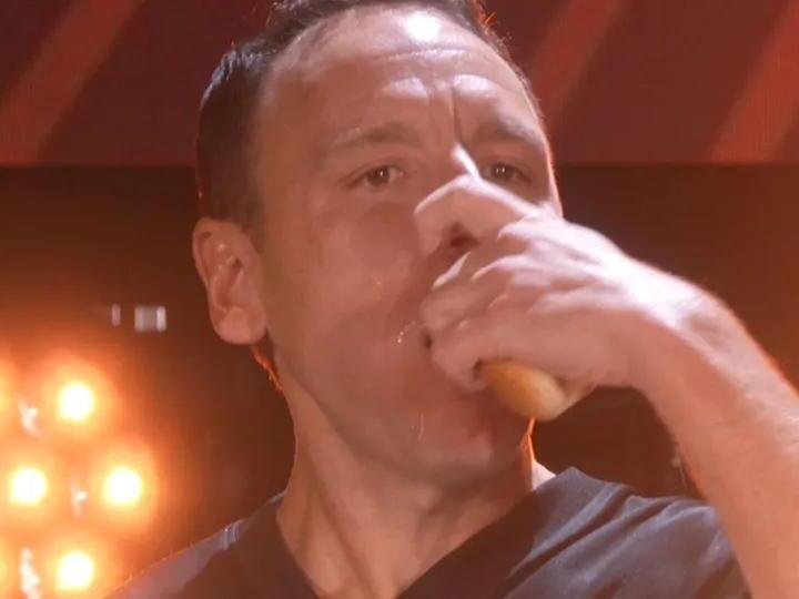 Joey Chestnut wins $100,000 after smashing world record with 83 hot ...