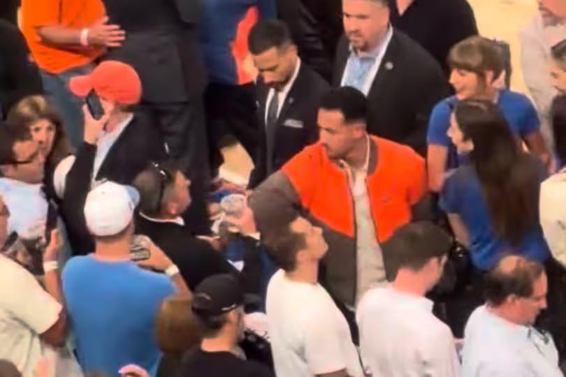 Taylor Swift makes chaotic Knicks entrance at MSG with fan angrily ...