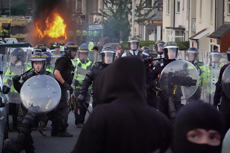More Than 50 Officers Injured in Riot During Vigil for Victims Stabbed ...