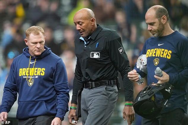 Scary moment veteran MLB umpire forced to leave game after 100mph foul ...