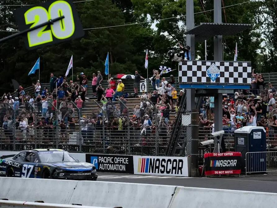 Shane Van Gisbergen Makes Late Pass at Portland for First Xfinity Win