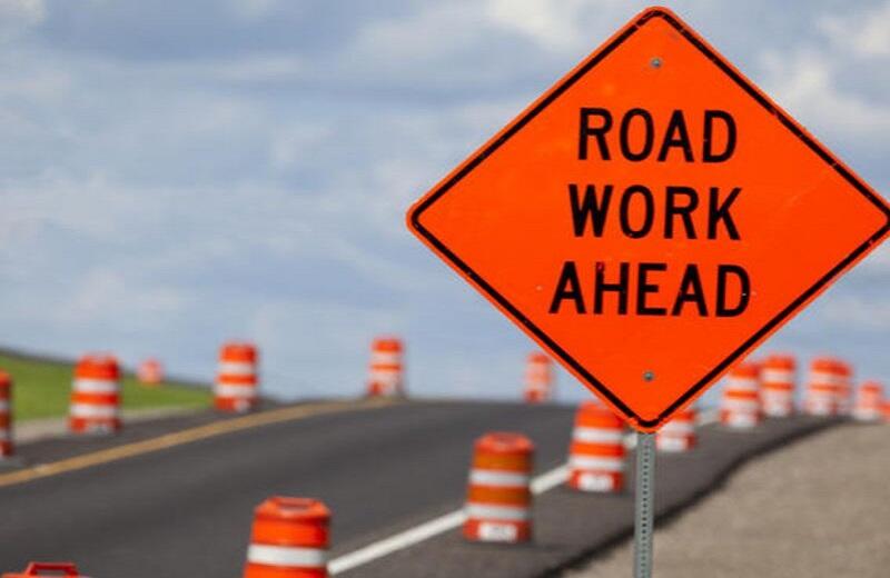 Temporary traffic signals to manage alternating one lane travel during ...