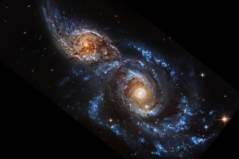 NASA telescopes capture images of 'eye-like' galaxies staring back at ...