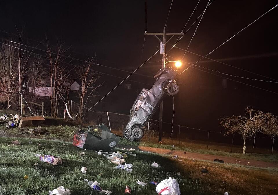 Pickup left hanging on power lines after early morning crash in ...