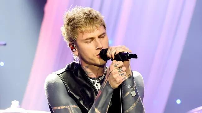 MGK Unveils Latest Ink With Striking New Ear Tattoos - NewsBreak